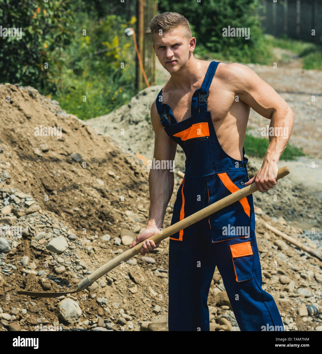 Strong hands with shovel hi-res stock photography and images - Alamy