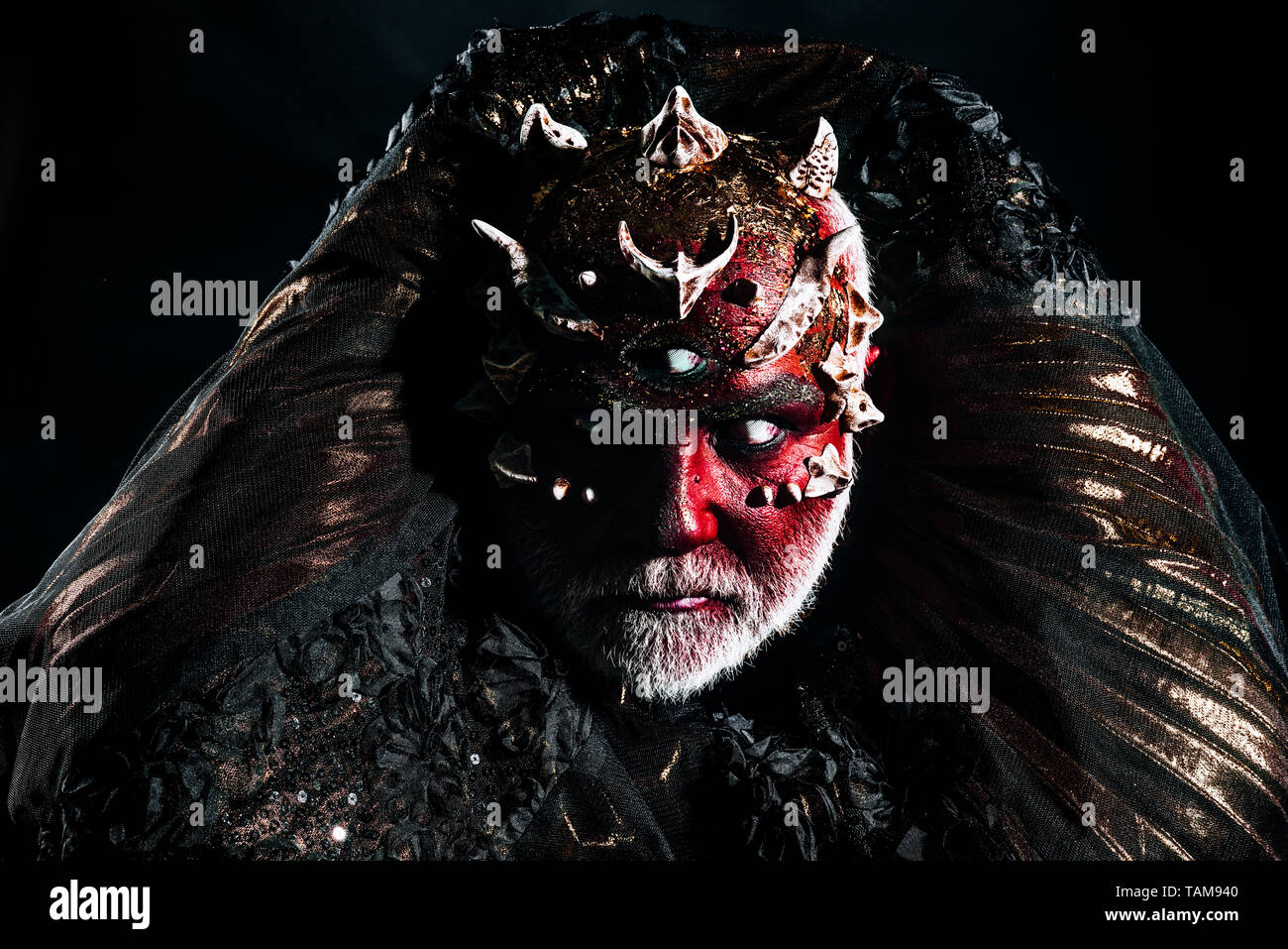 halloween devil. man with makeup of devil on halloween. scary and ...