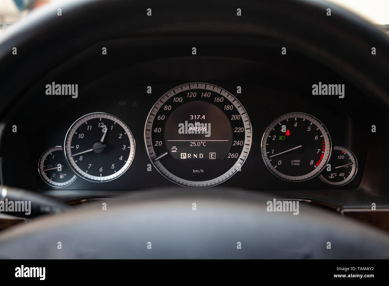 Car dashboard with speedometer, tachometer, clock, fuel tank gauge, oil ...