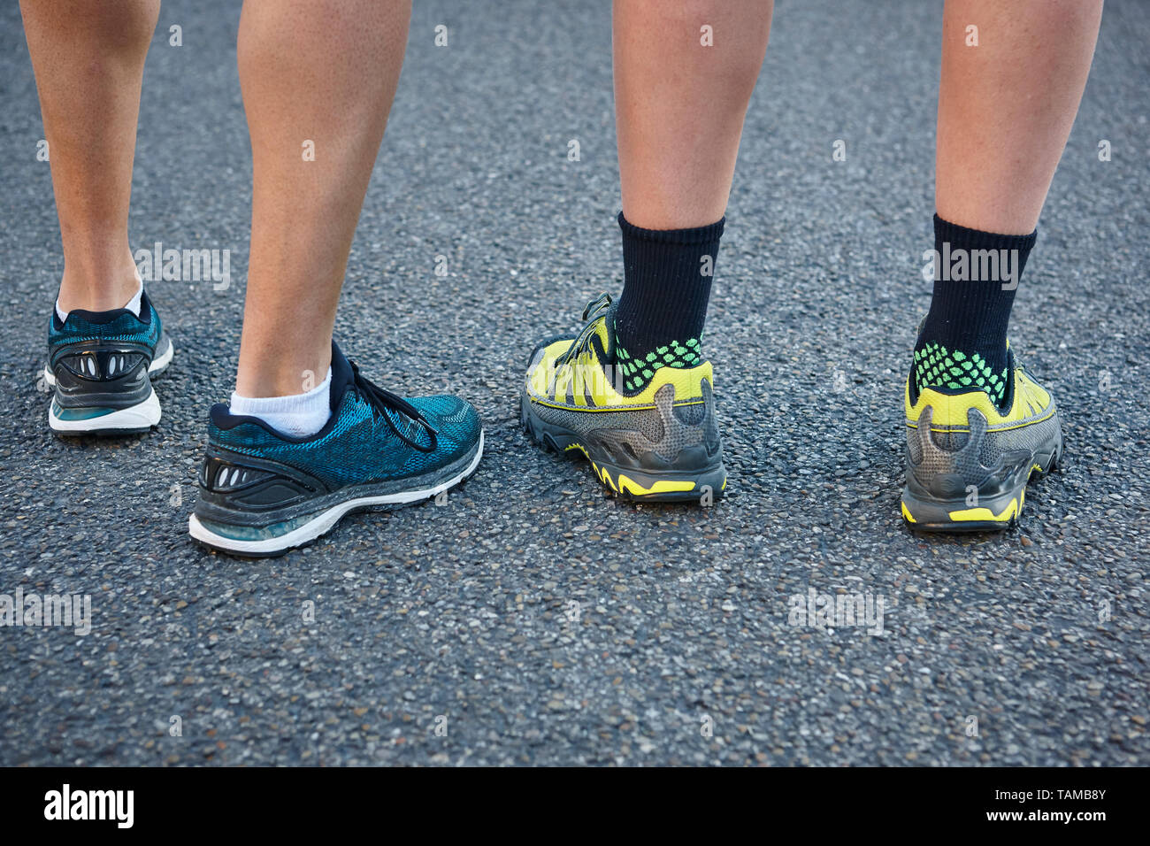 Male sneakers on asphalt road hi-res stock photography and images - Alamy