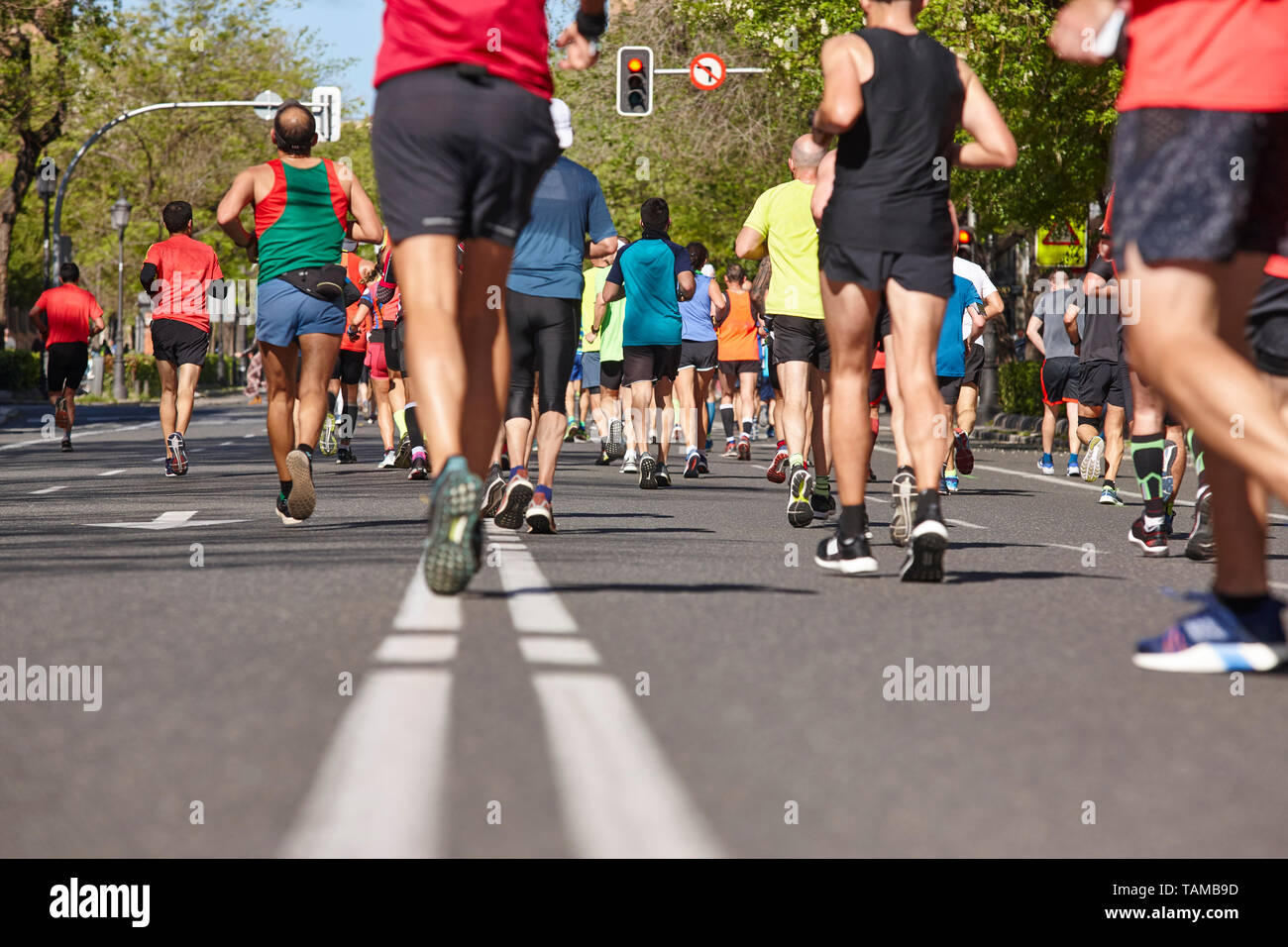 Marathon runners on the street. Healthy lifestyle. Athlete endurance ...