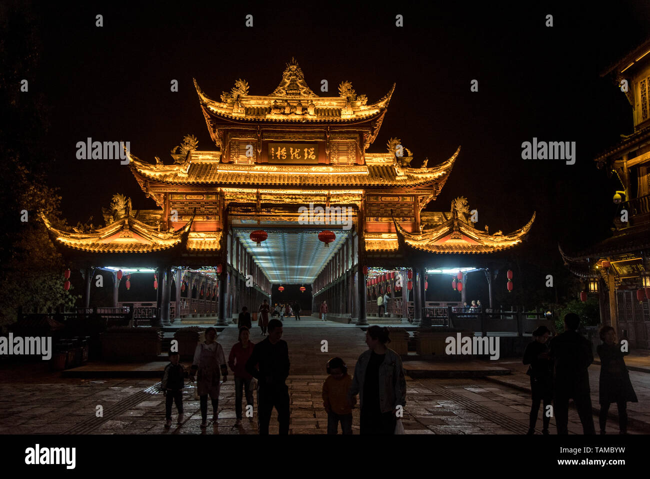 Night view of the ancient Chinese gate at Qintai Road historic district ...