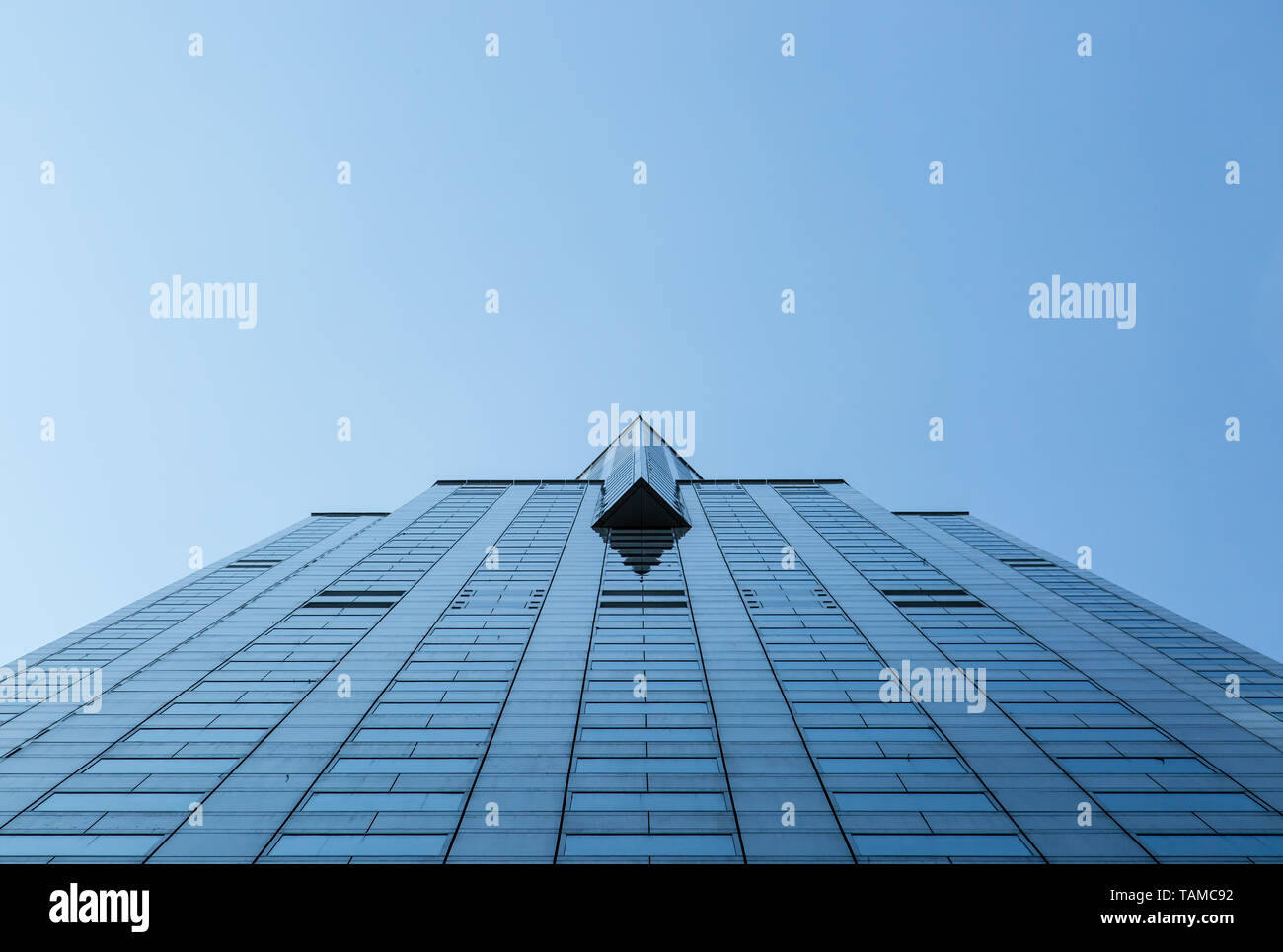 tall tower blue glass facade building Stock Photo - Alamy