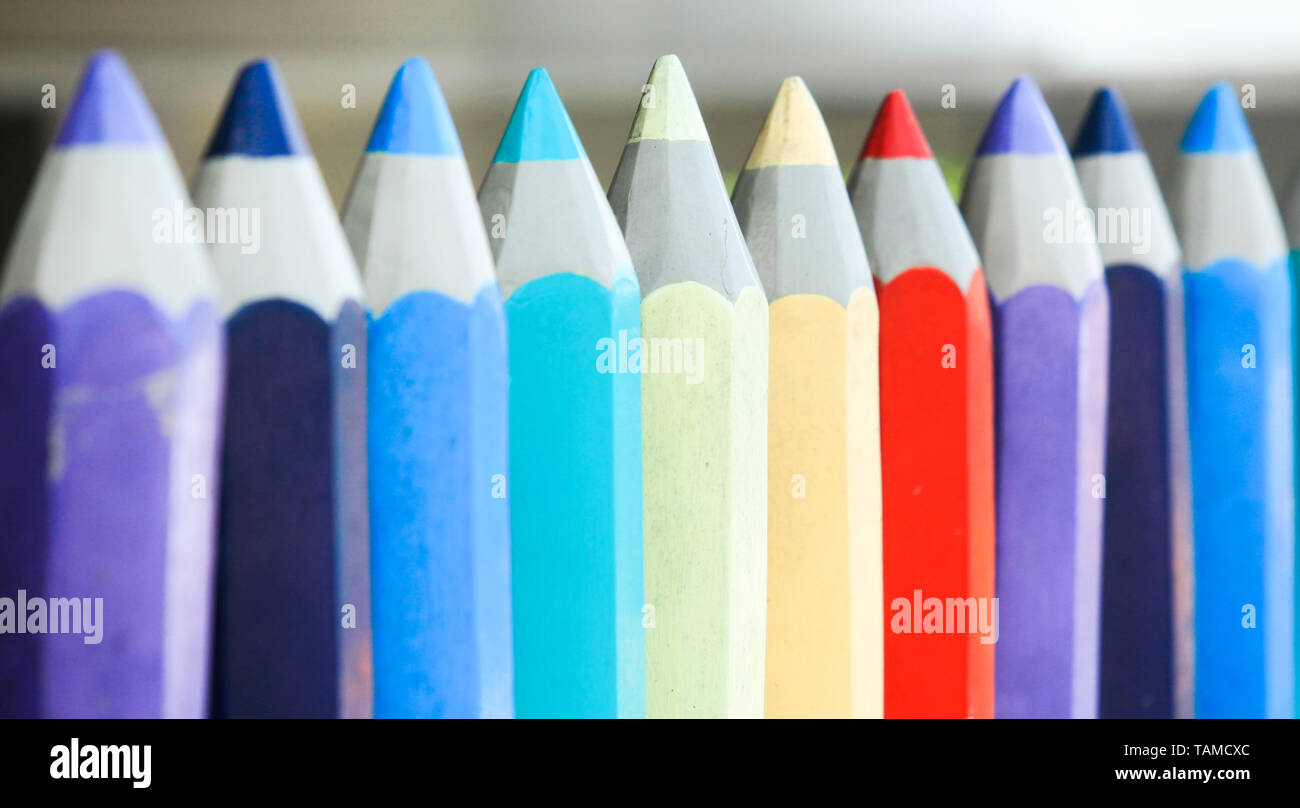 colour pencil wall in a kids care Stock Photo - Alamy