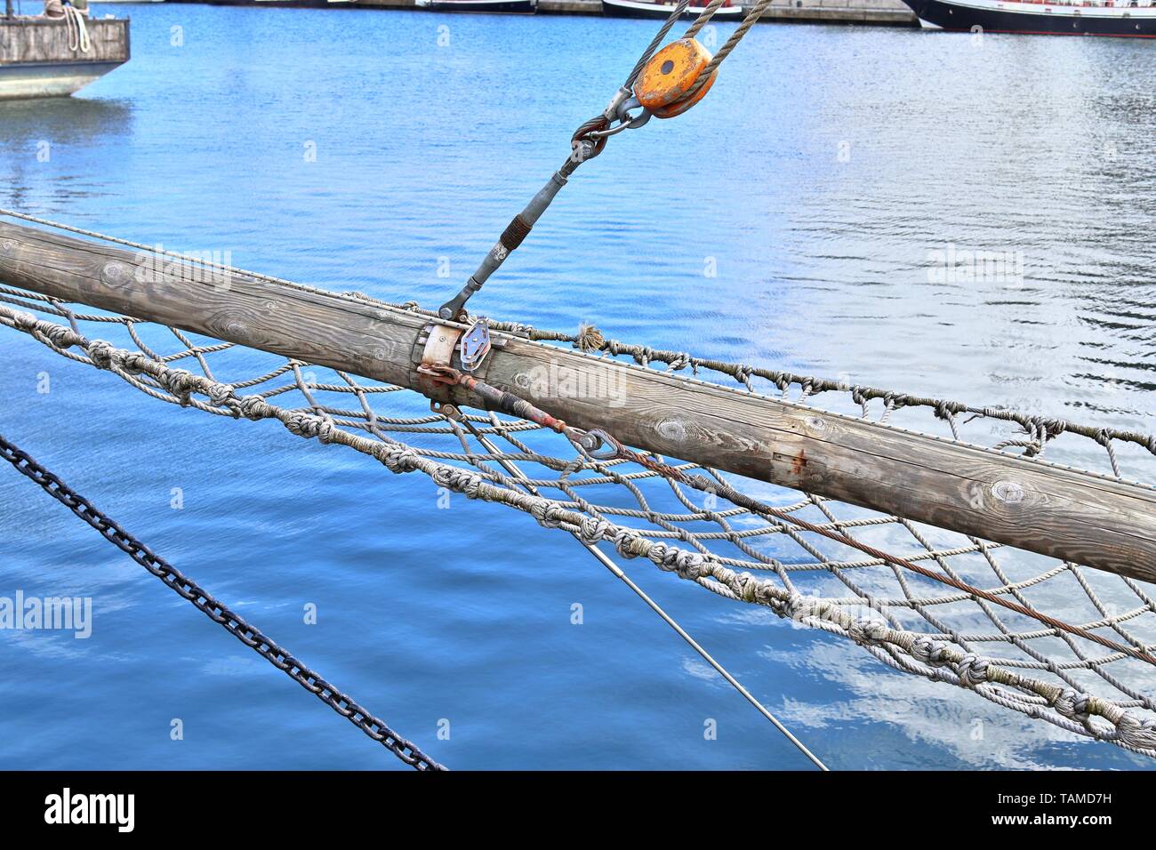 Old sailing shop mast and rope at the port of Kiel on a sunny day Stock ...