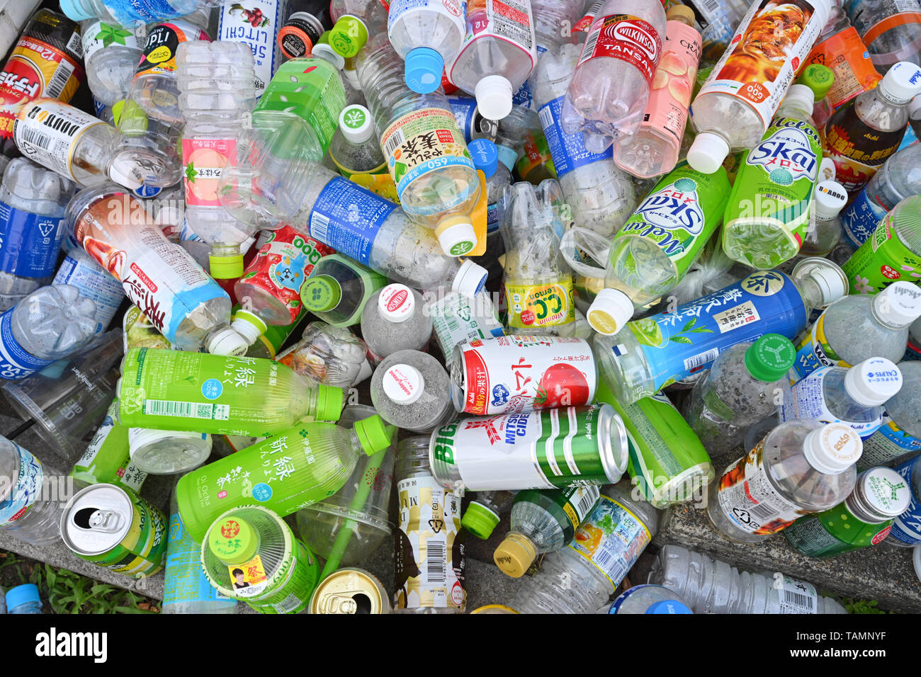 Used plastic bottles are seen next to vending machines in Toda, Saitama ...