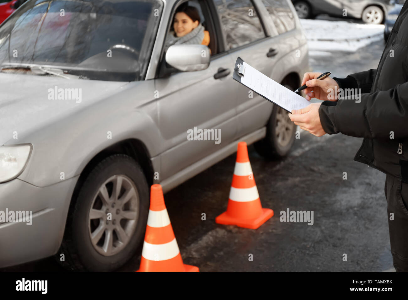 Instructor conducting driver licence test Stock Photo - Alamy