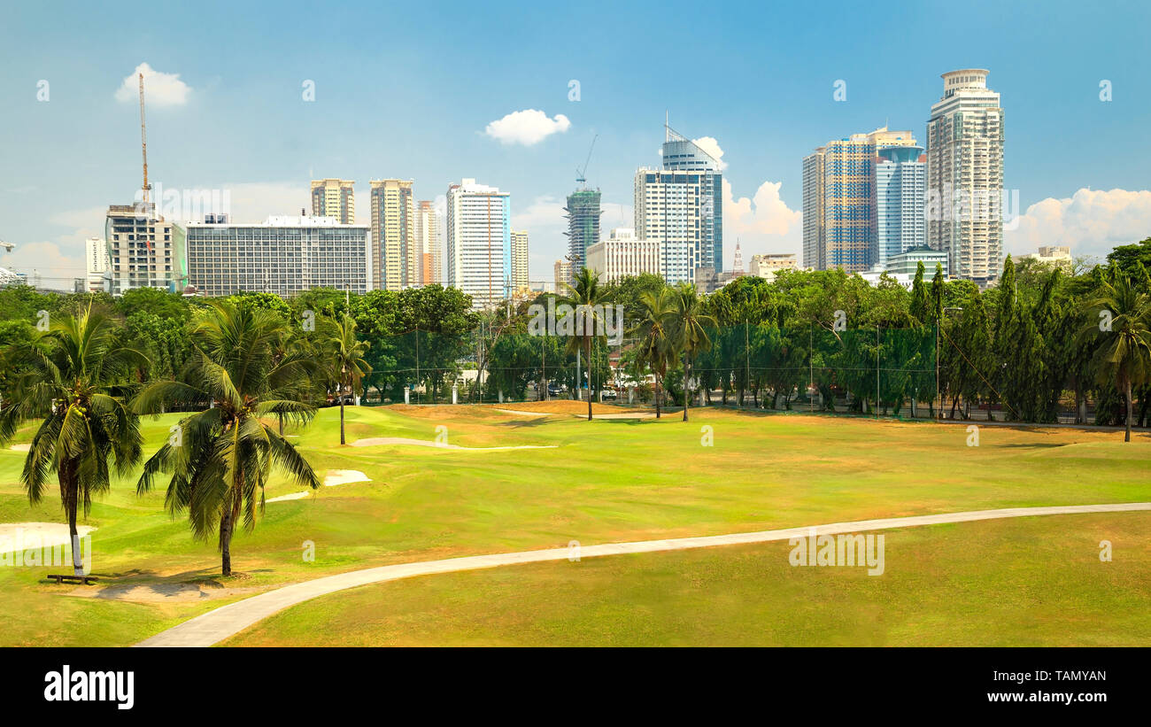 Golf course field with pond near Intramuros, Manila, Philippines Stock ...