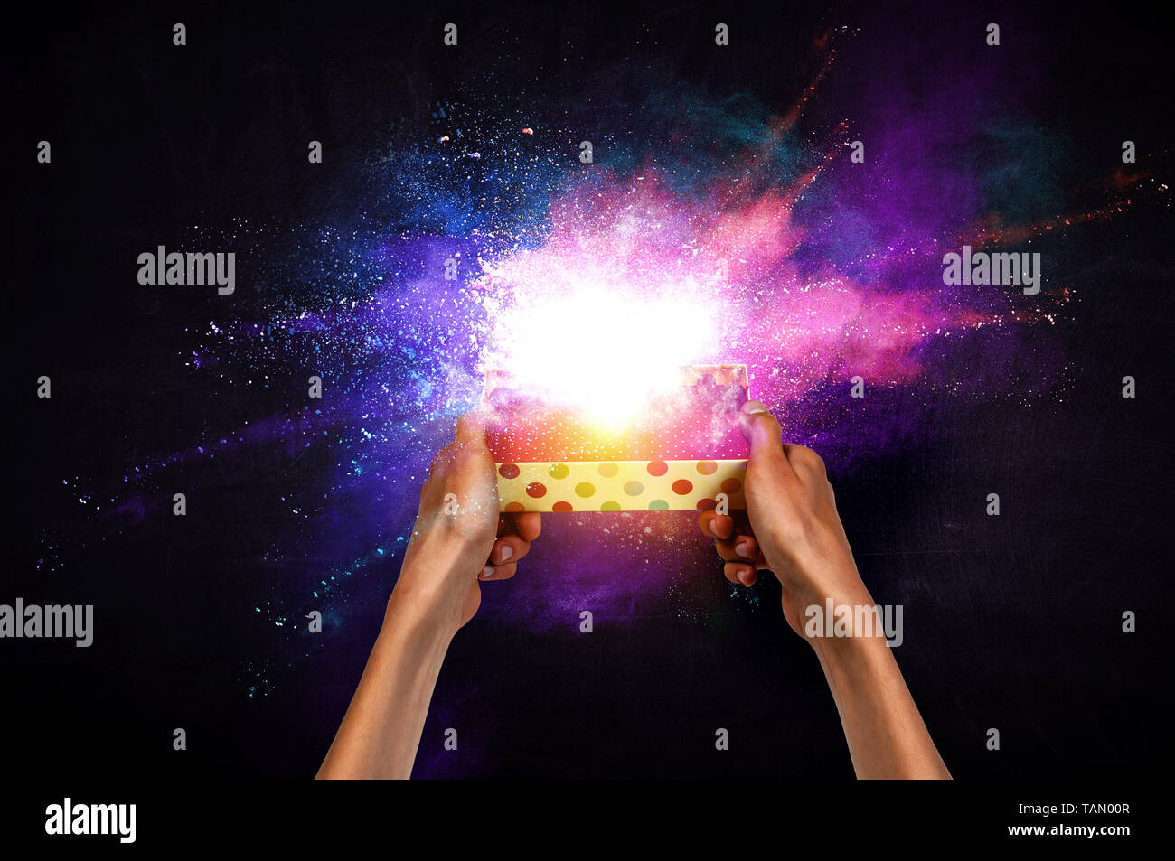 Man s hands holding a small magic cardboard box hi-res stock ...