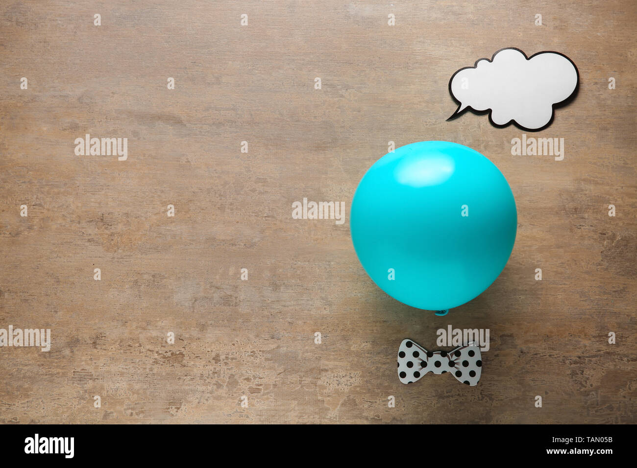 Funny balloon on grey background Stock Photo - Alamy