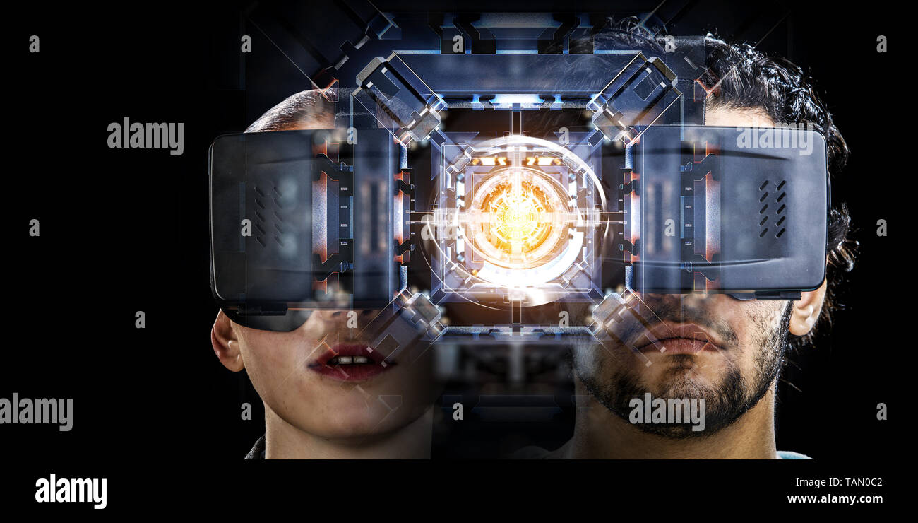 Two young people in VR headsets on abstract tech background. Mixed ...