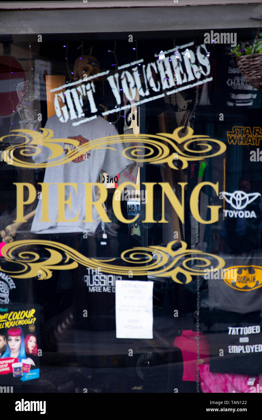 The Sharp Practice tattoo and piercing studio shopfront window Stock ...