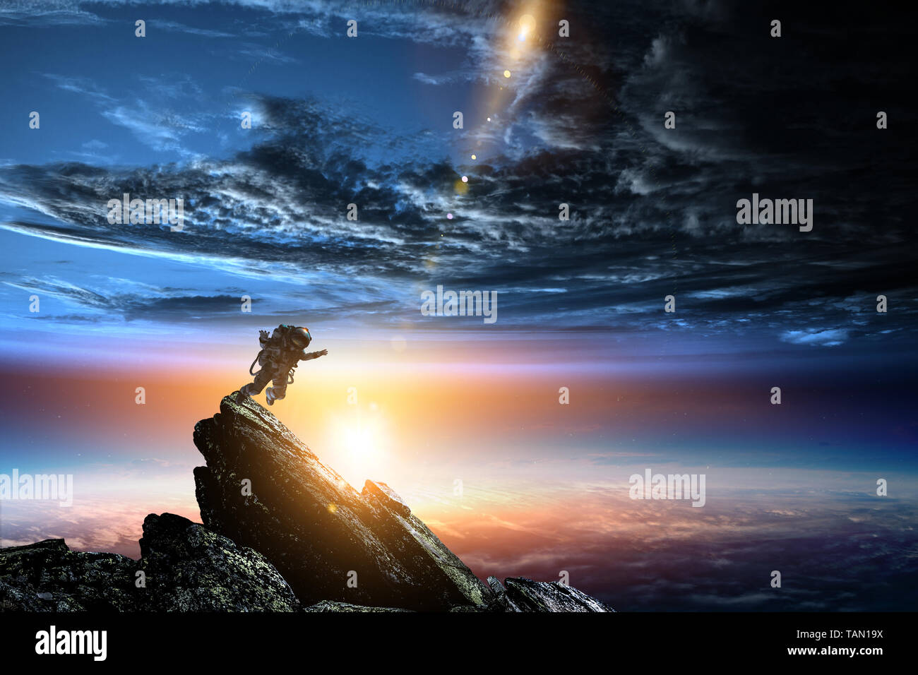 Spaceman and planet, human in space concept Stock Photo - Alamy
