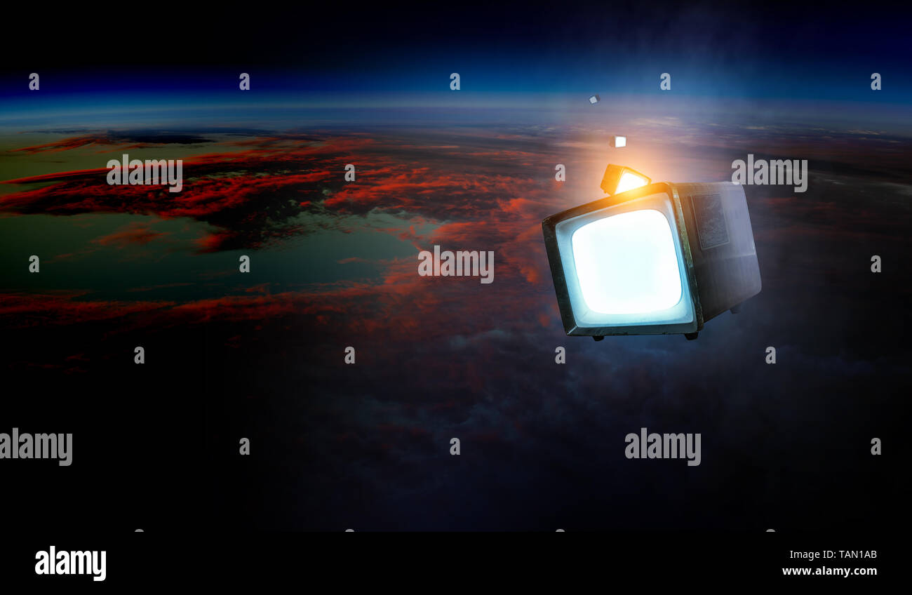 Retro TV flying in space Stock Photo - Alamy