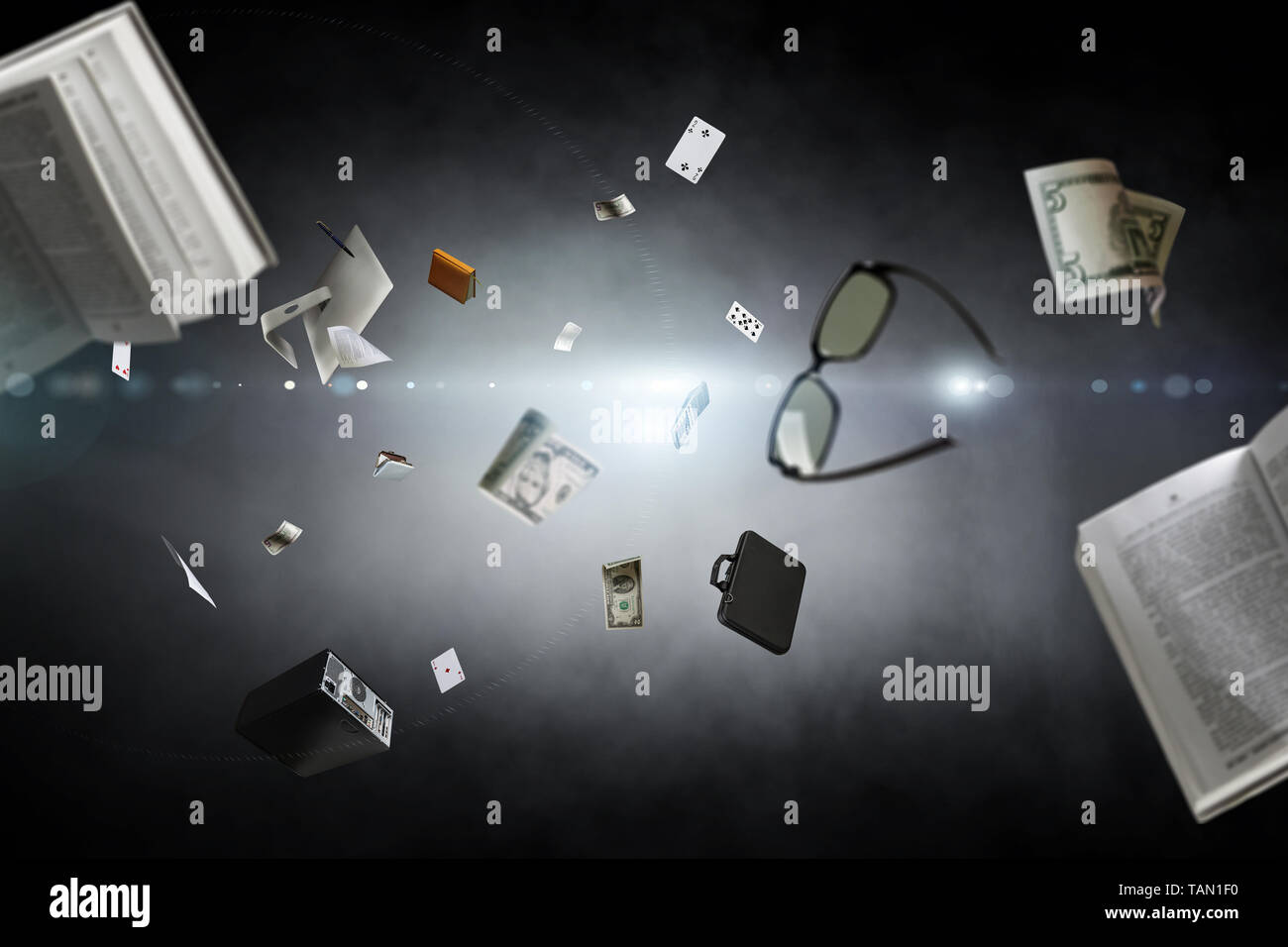 Office objects flying isolated on dark Stock Photo - Alamy