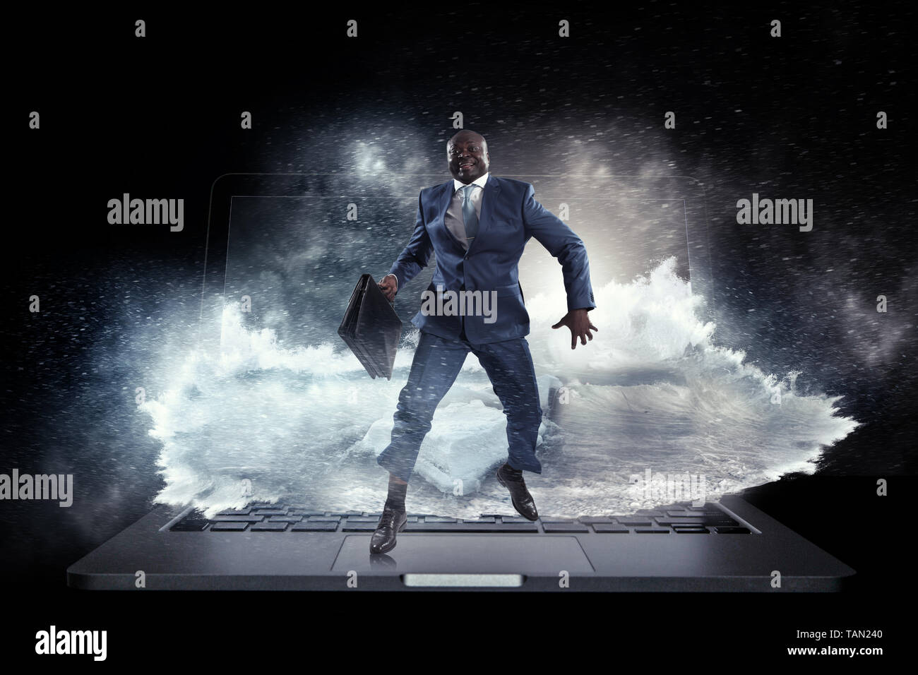 Black businessman running on laptop keybord followed by wave of pouring ...