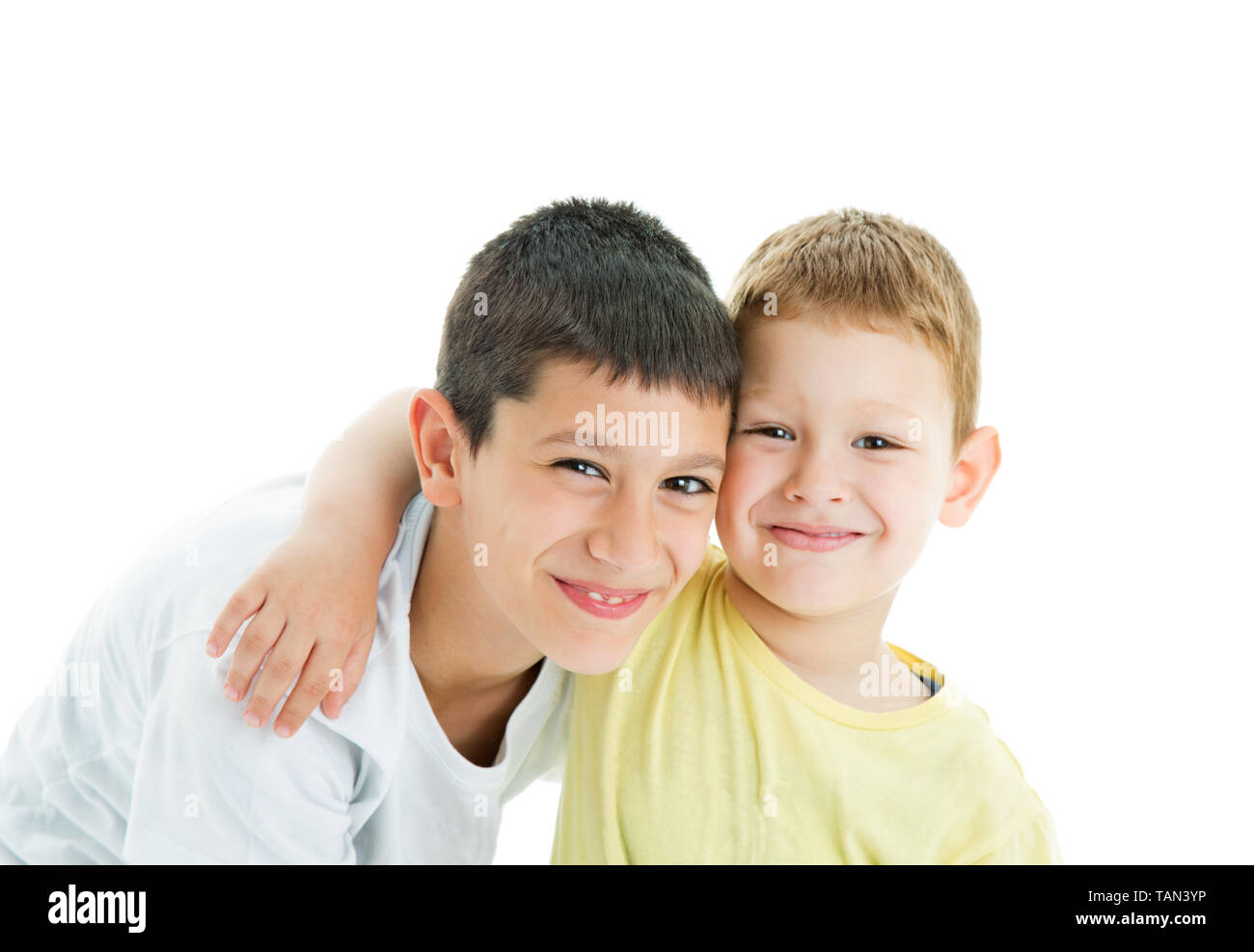 Two happy joyful and loving brothers isolated on white background ...