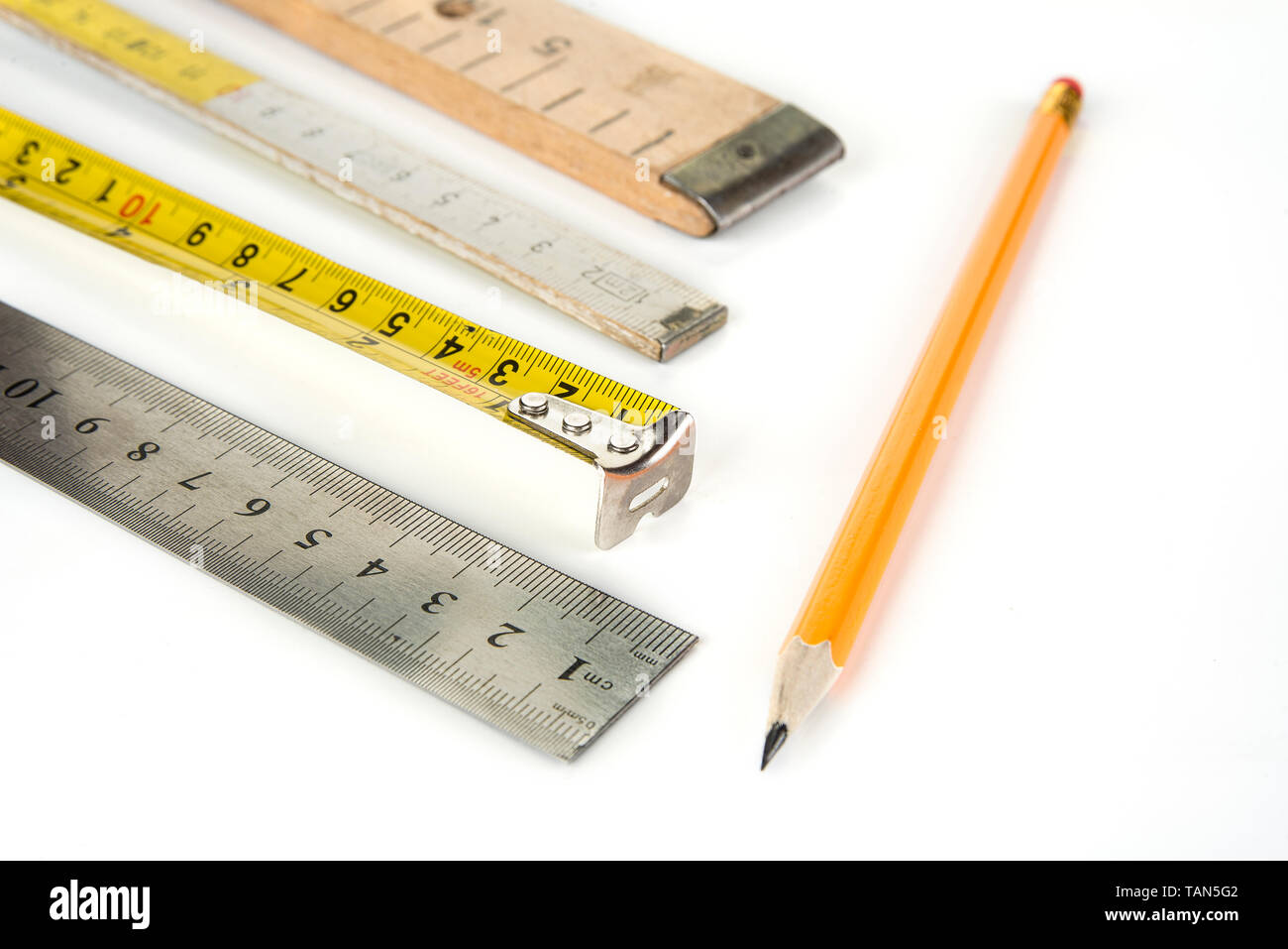 Various meters on a white background with pencil Stock Photo - Alamy