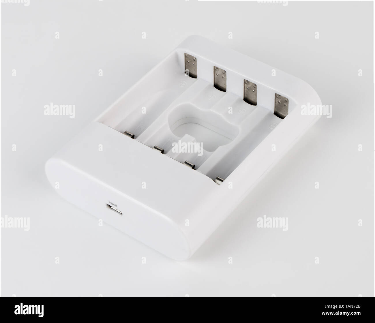 White battery charge isoalted on white background Stock Photo - Alamy