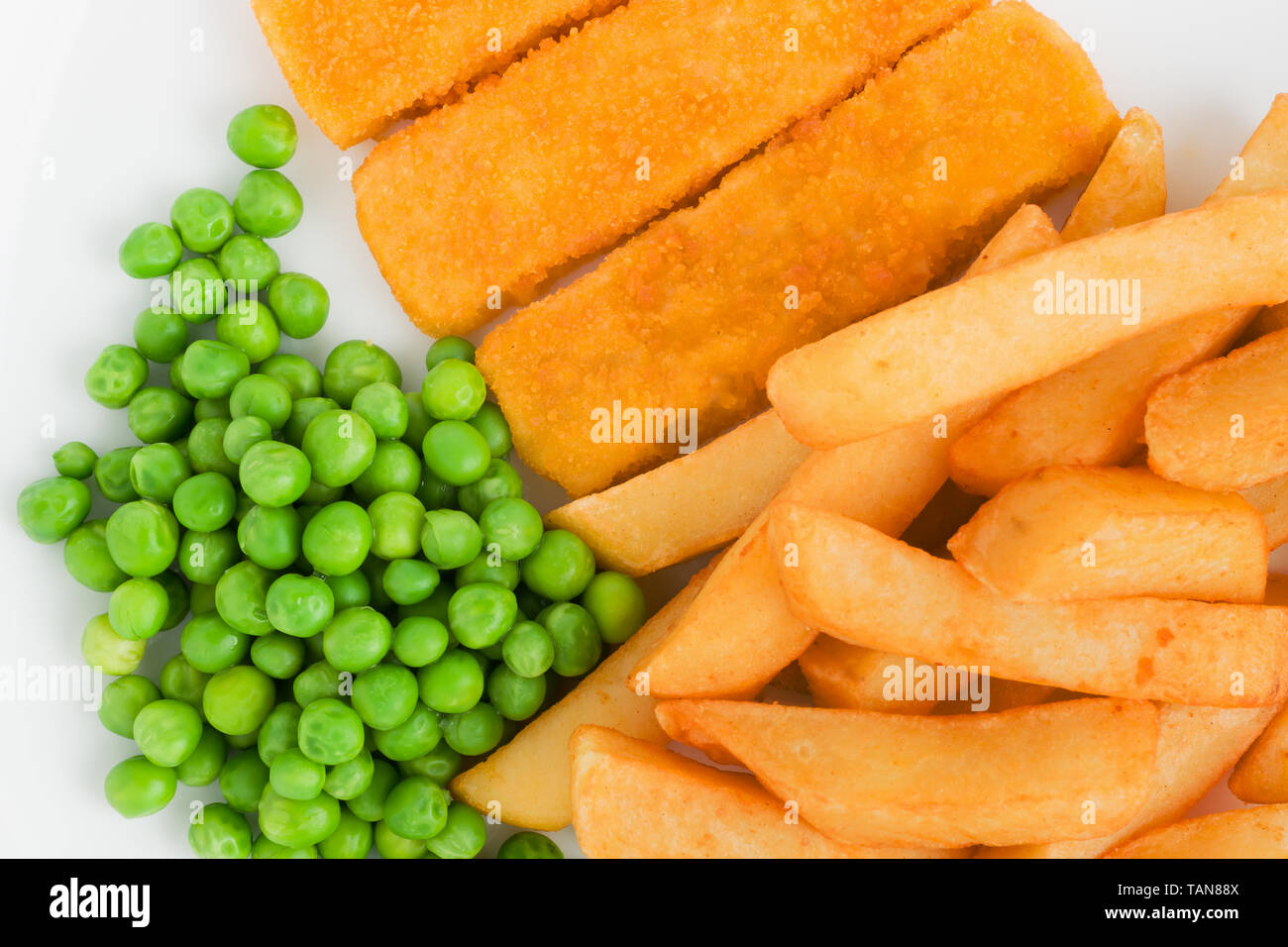 Fish fingers chips and peas a popular children's meal Stock Photo - Alamy
