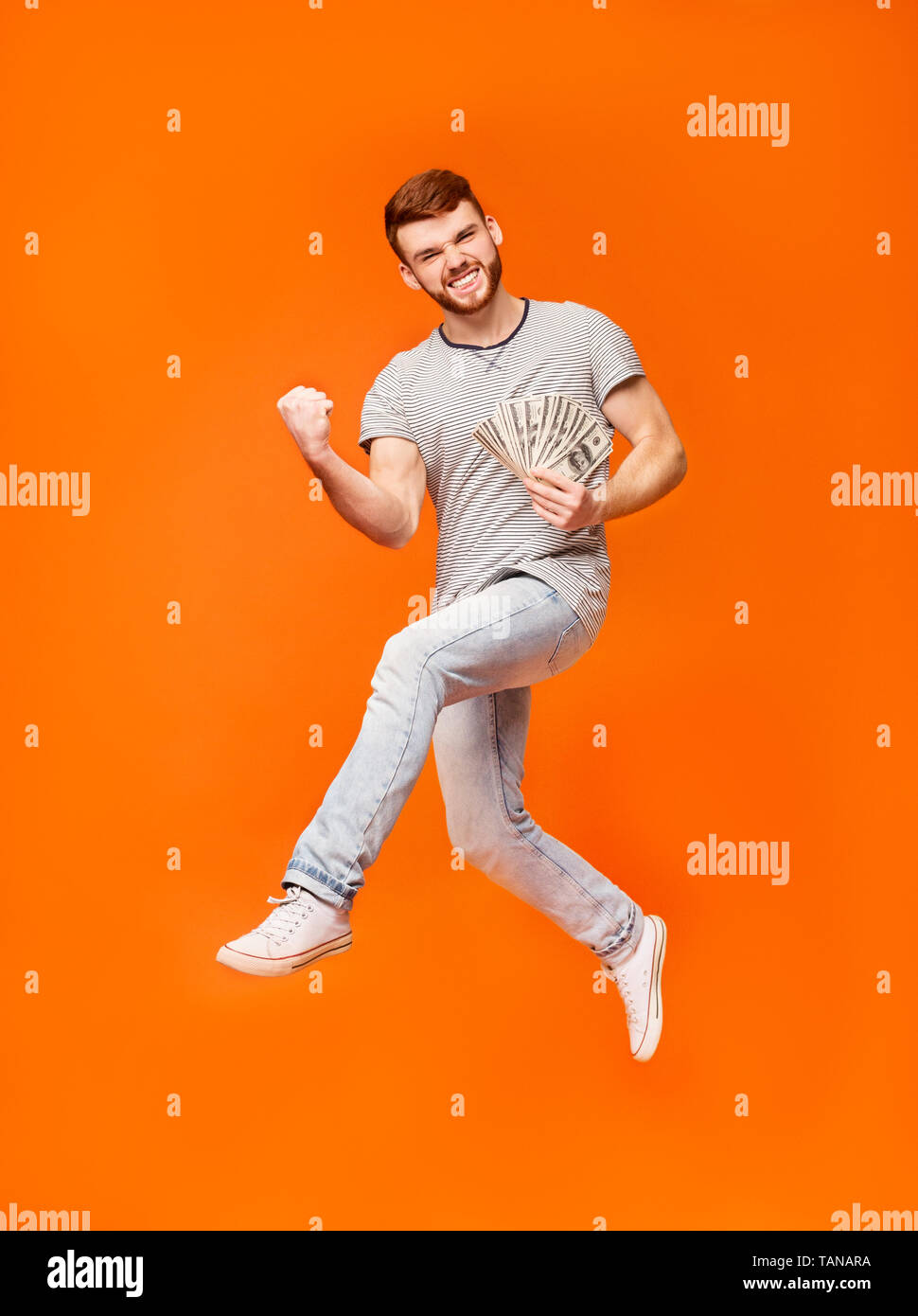 Orange laughing jumping hi-res stock photography and images - Alamy