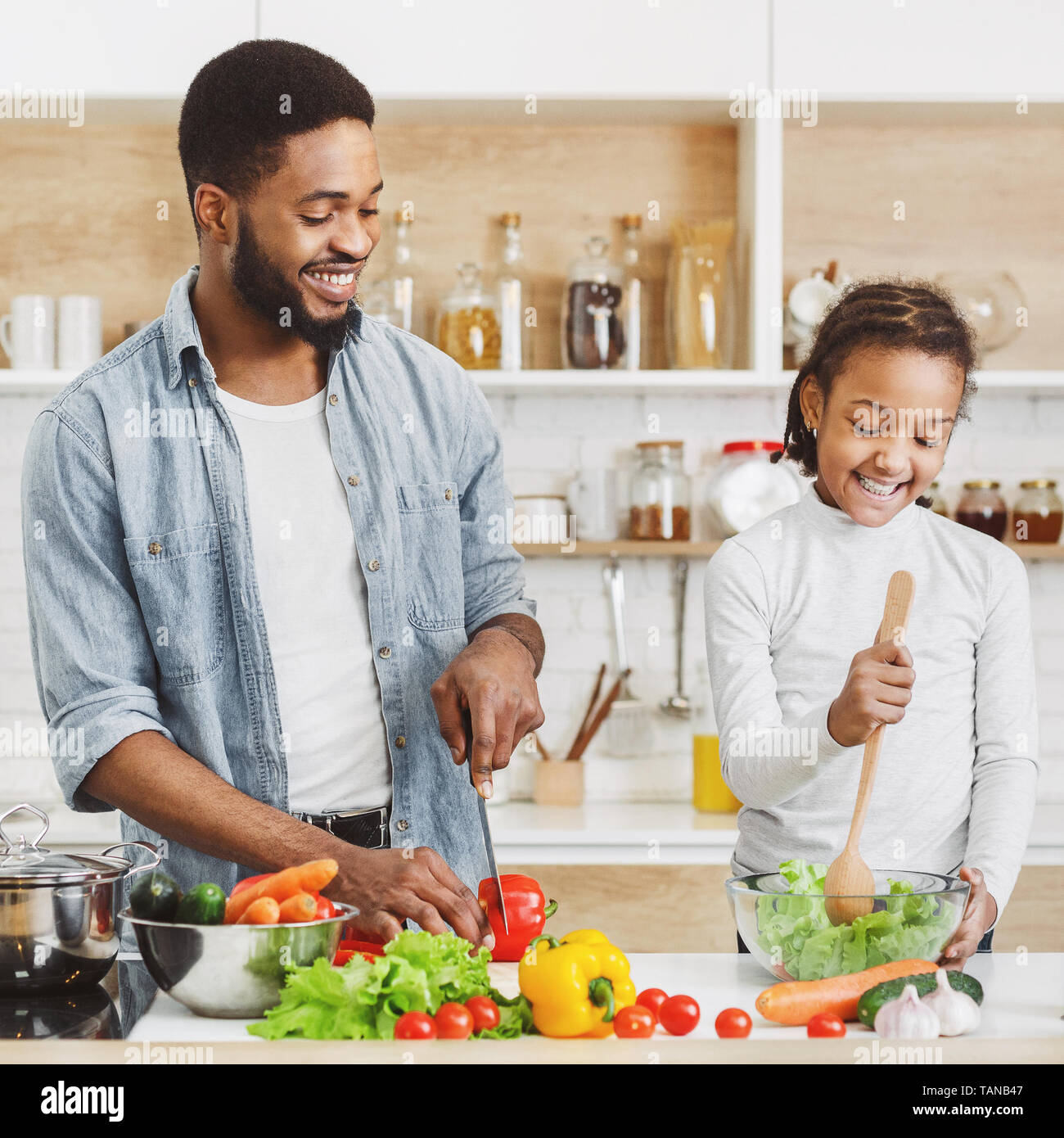 Cooking vegetarian food together concept Stock Photo - Alamy