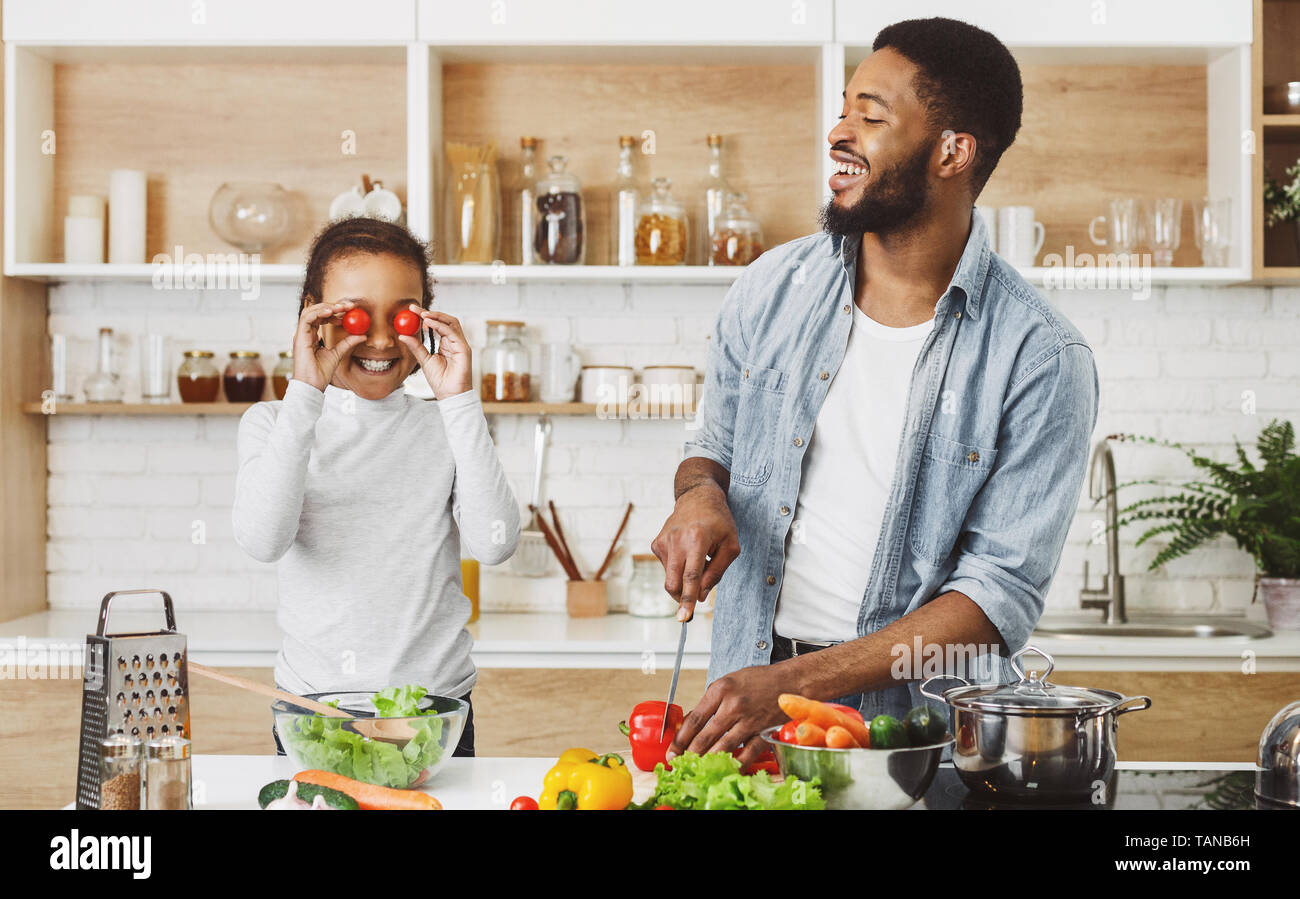 Funny cooking together concept Stock Photo - Alamy