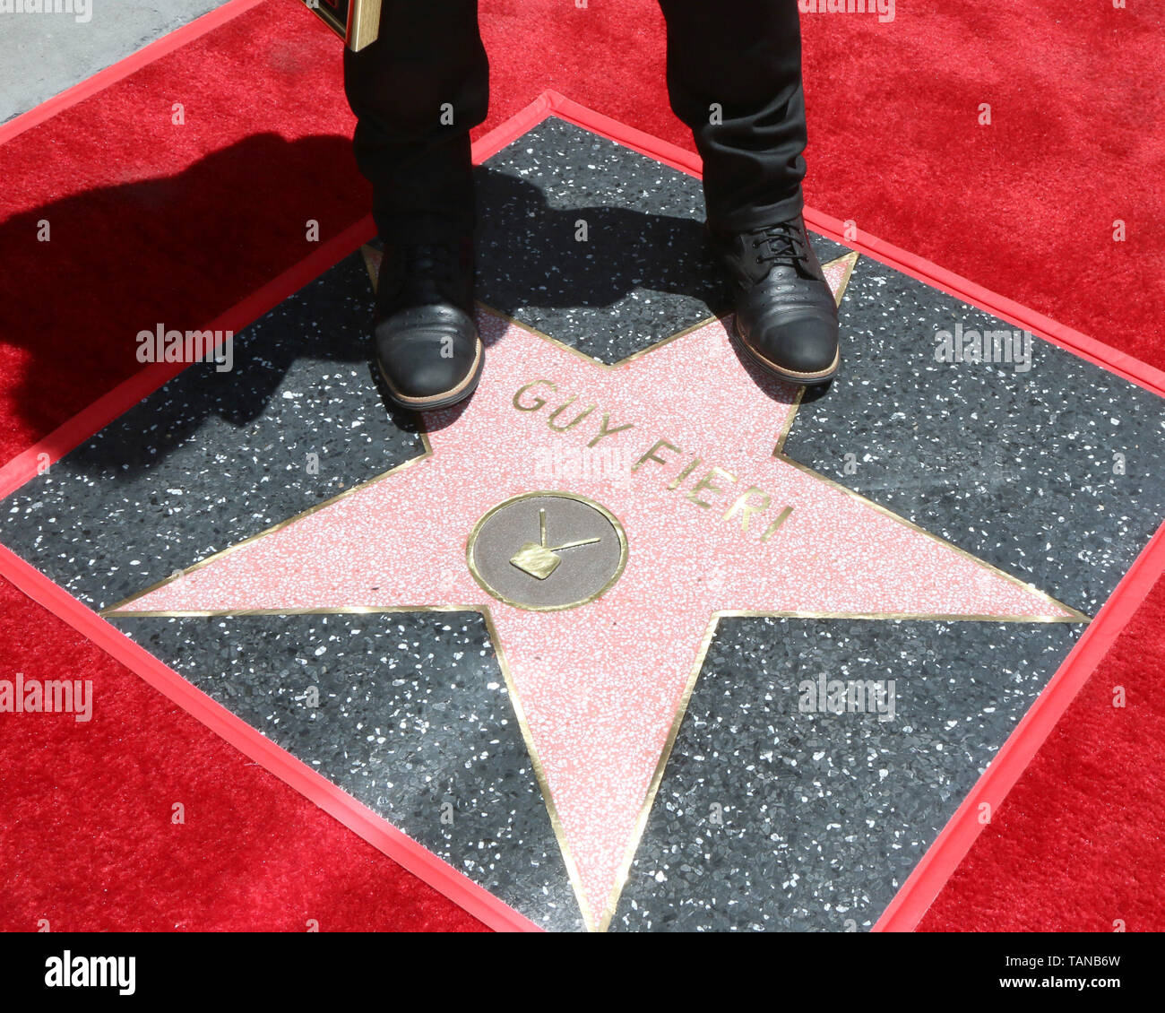Guy fieri feet on his wof star hi-res stock photography and images - Alamy
