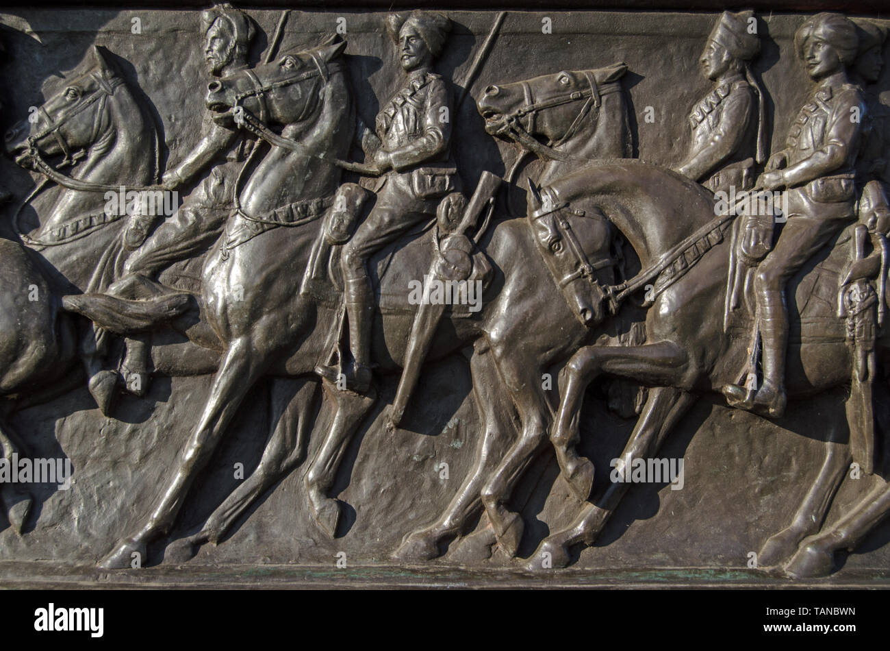 Detail of the bronze frieze of soldiers riding their horses on the Cavalry Monument dedicated to ...