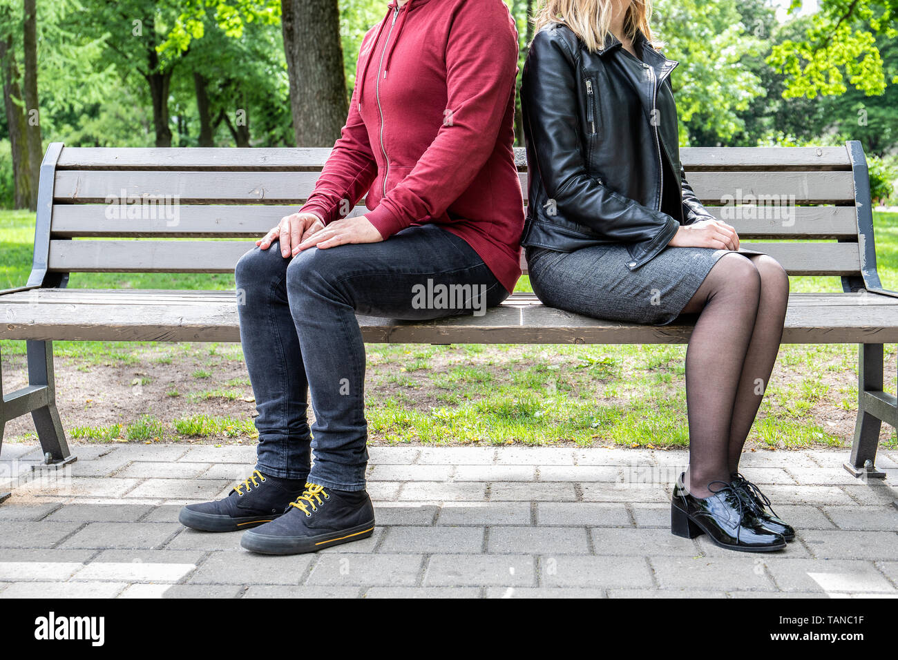 Relationship and body language concept. Couple - man and women sitting ...