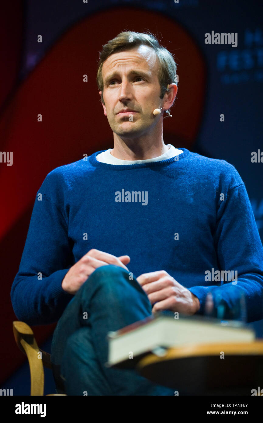 Robert Macfarlane British travel writer speaking on stage at Hay ...