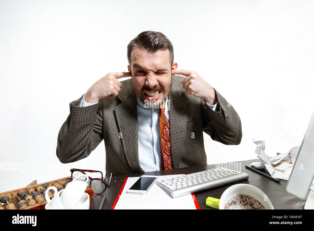 Voices in his head. Young man suffering from the colleagues' talks in ...