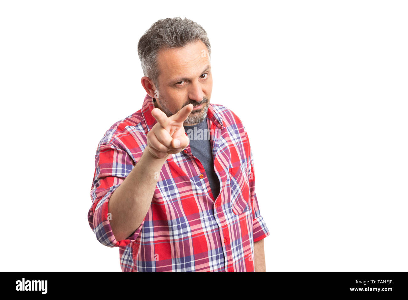 Man with serious expression pointing fingers at camera as eyes on you ...