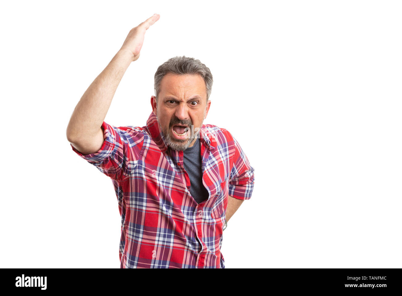 Man with frustrated expression holding palm up making angry gesture and ...
