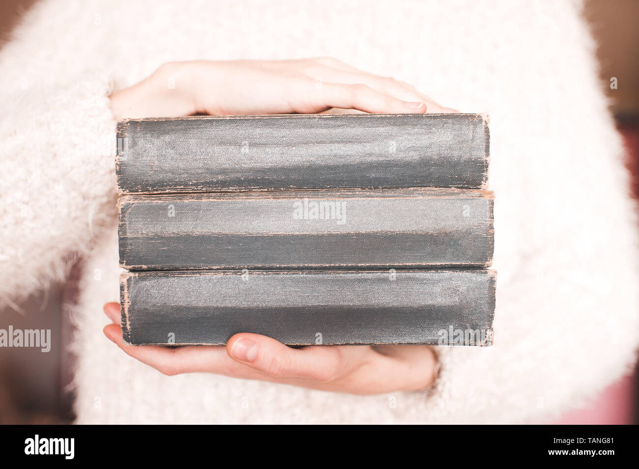 Girl holding stack paper hi-res stock photography and images - Alamy