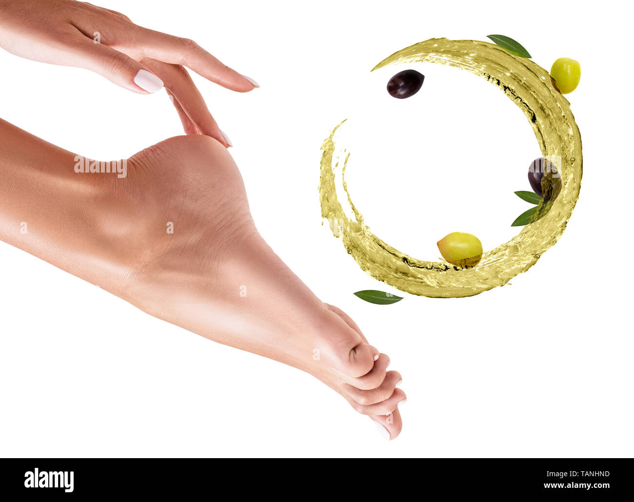 Circulate splash of olive oil near female feet. Skincare concept Stock ...