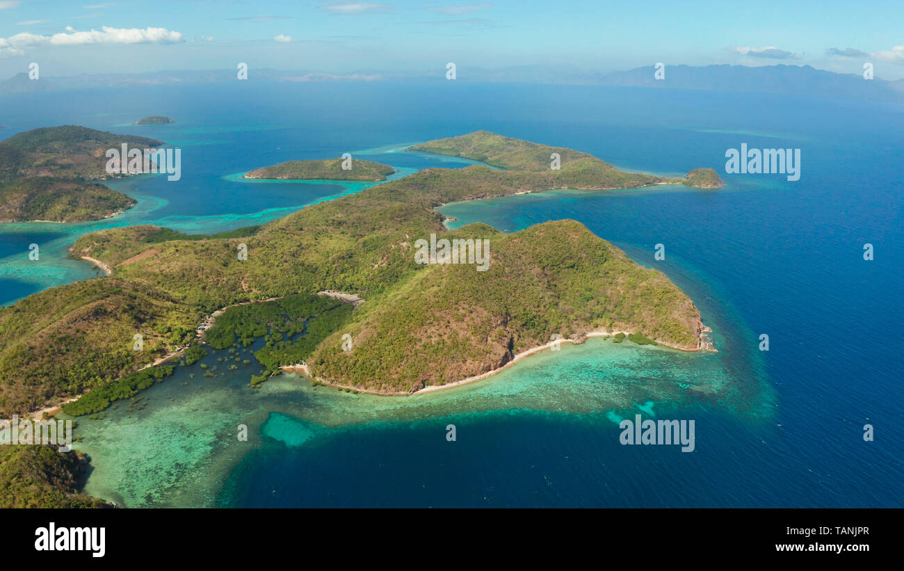 aerial seascape Lagoons with blue, azure water in middle of small ...