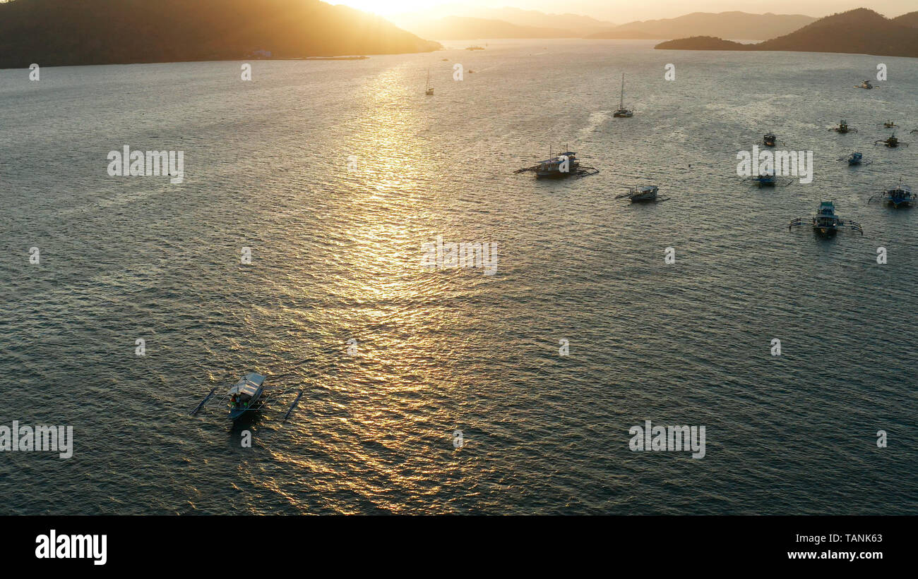 aerial view Sea bay with boats at sunset. Sunset over the sea with ...