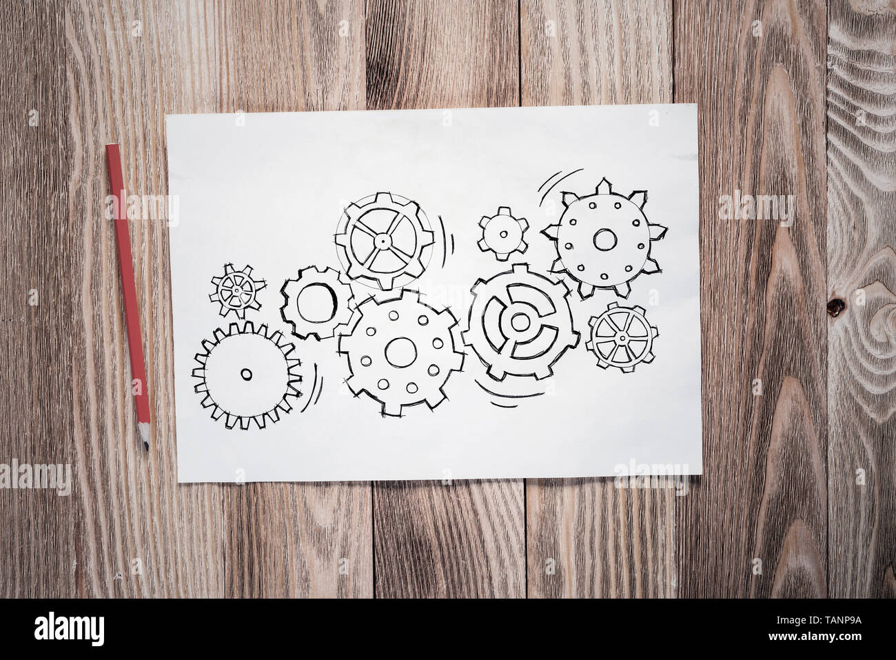 Cogwheels hand drawn illustration on paper sheet Stock Photo - Alamy Cogwheels hand drawn illustration on paper sheet Stock Photo - Alamy