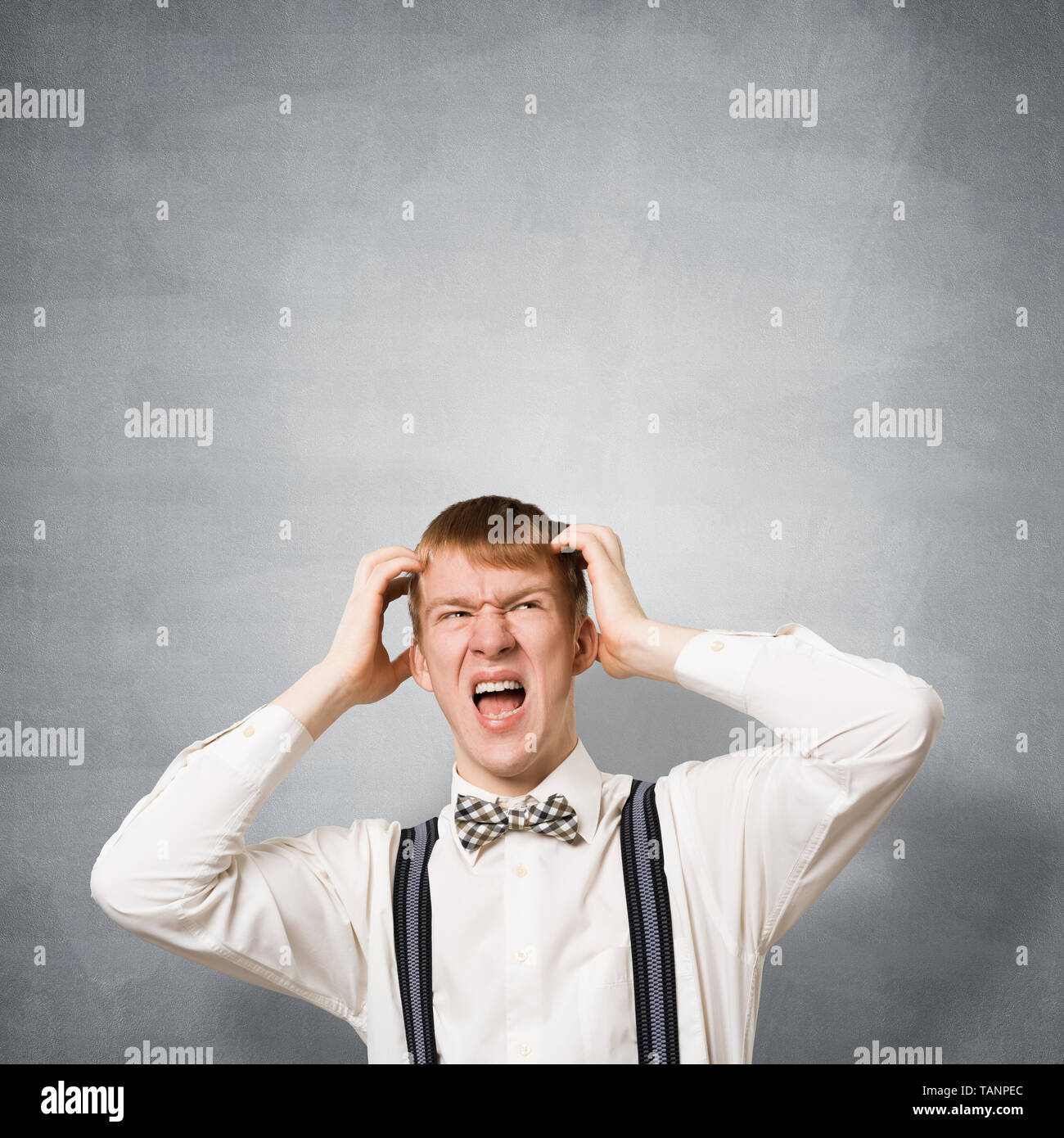 Stressful teenager screaming with panic Stock Photo - Alamy