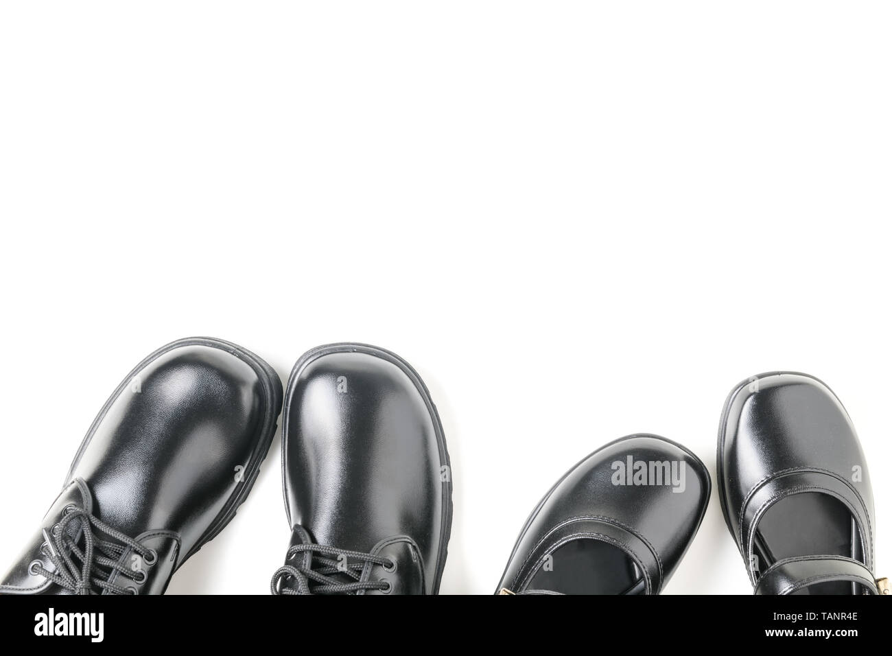 Two new leather student shoes isolated on white background with copy ...