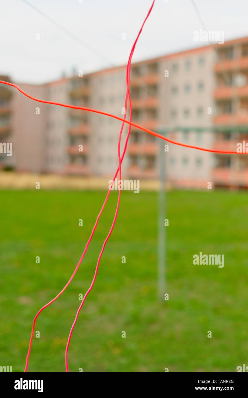 Fluorescent pink coloured plastic clothes / washing / laundry line ...