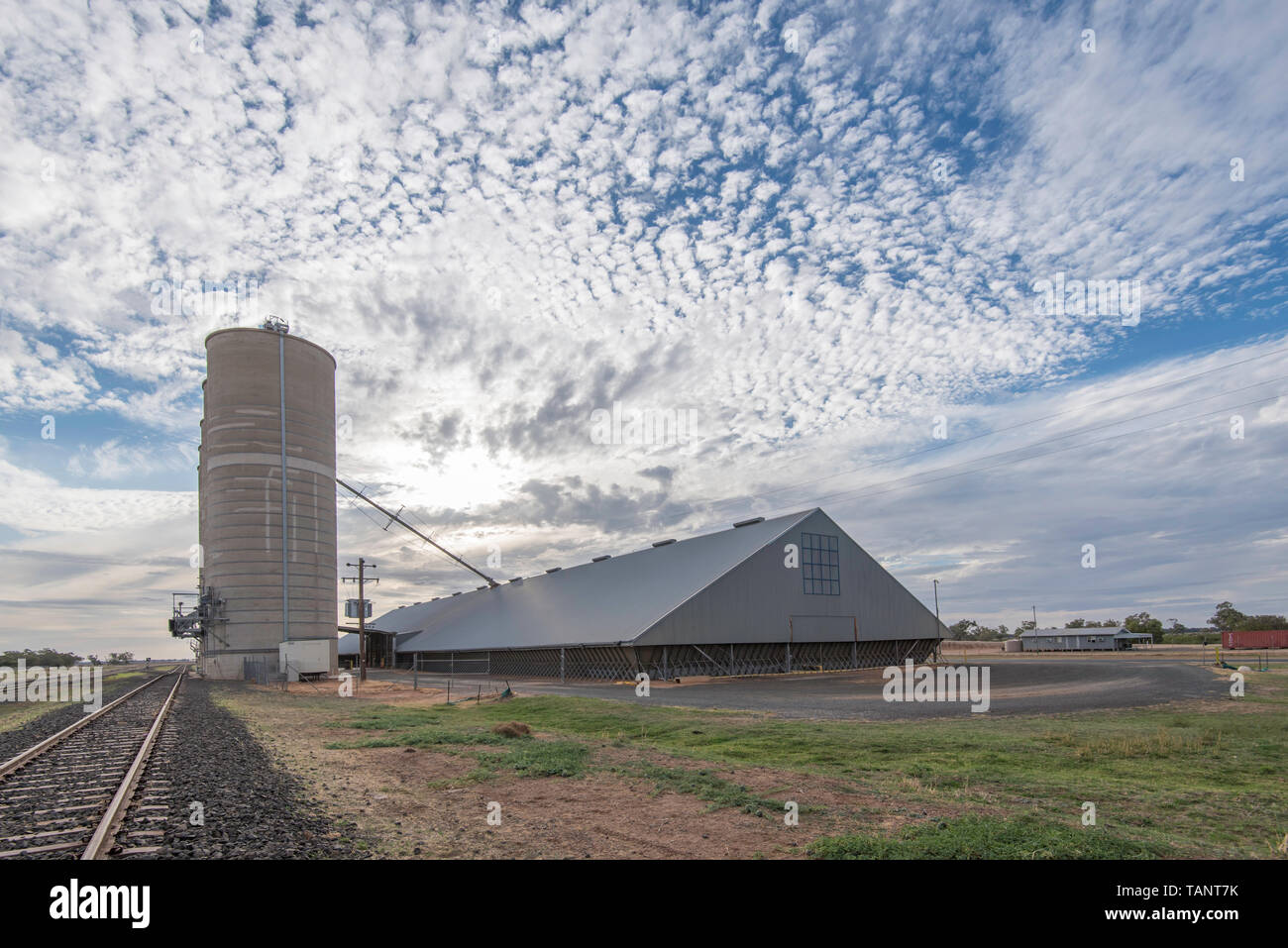 Late afternoon clouds over the grain silos and bunker beside the ...
