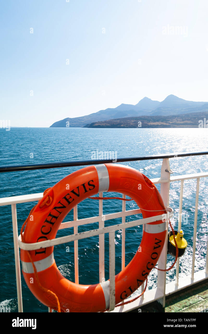 The isle of Rum seen from a calmac ferry Stock Photo - Alamy