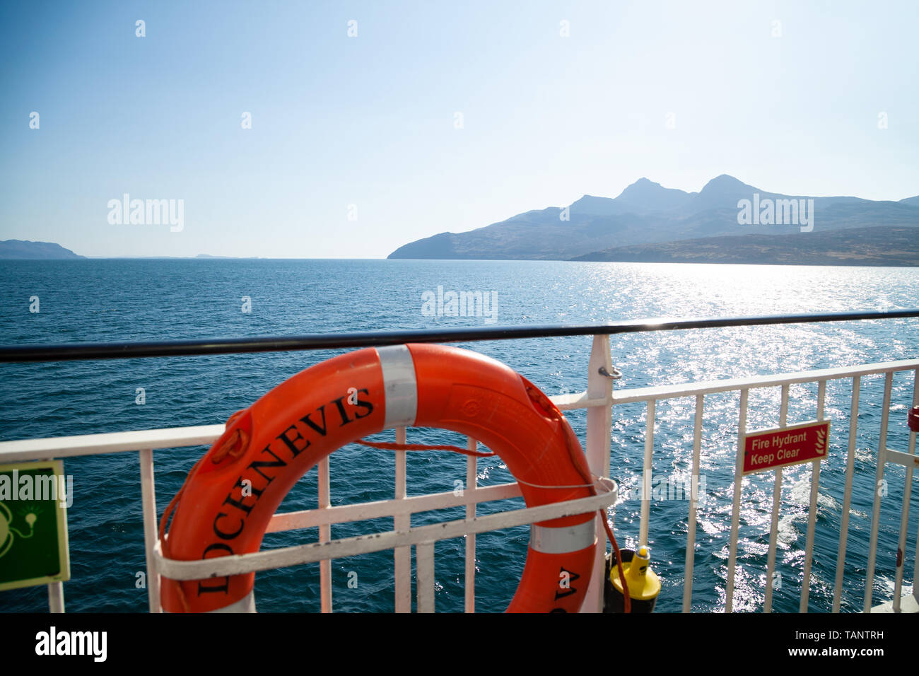 The isle of Rum seen from a calmac ferry Stock Photo - Alamy