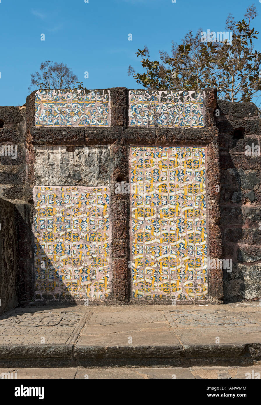 Tiled wall inside the ruins of Church of St. Augustine, Old Goa, India ...