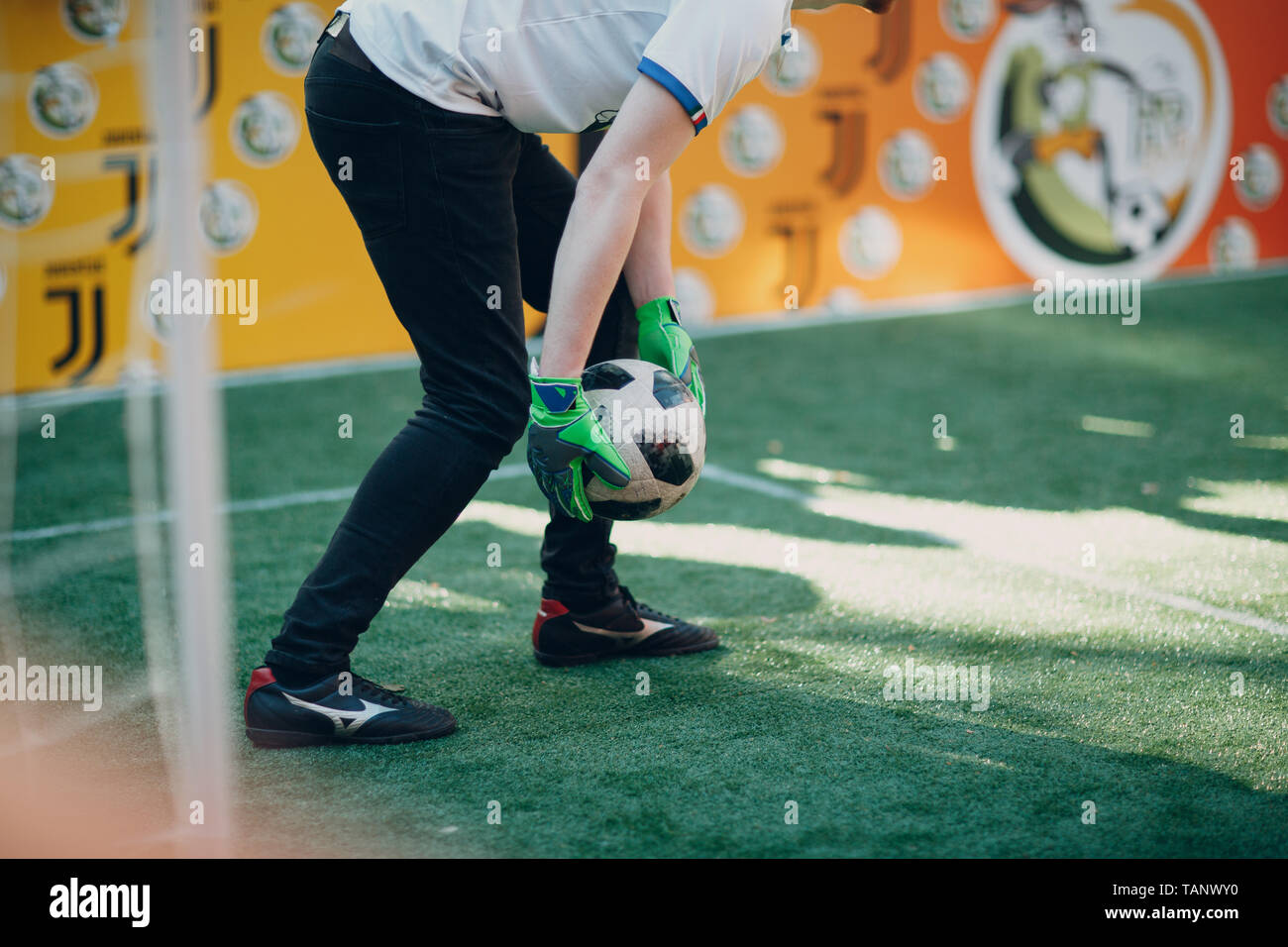 Soccer goalkeeper loses the ball and prepares to pass Stock Photo - Alamy