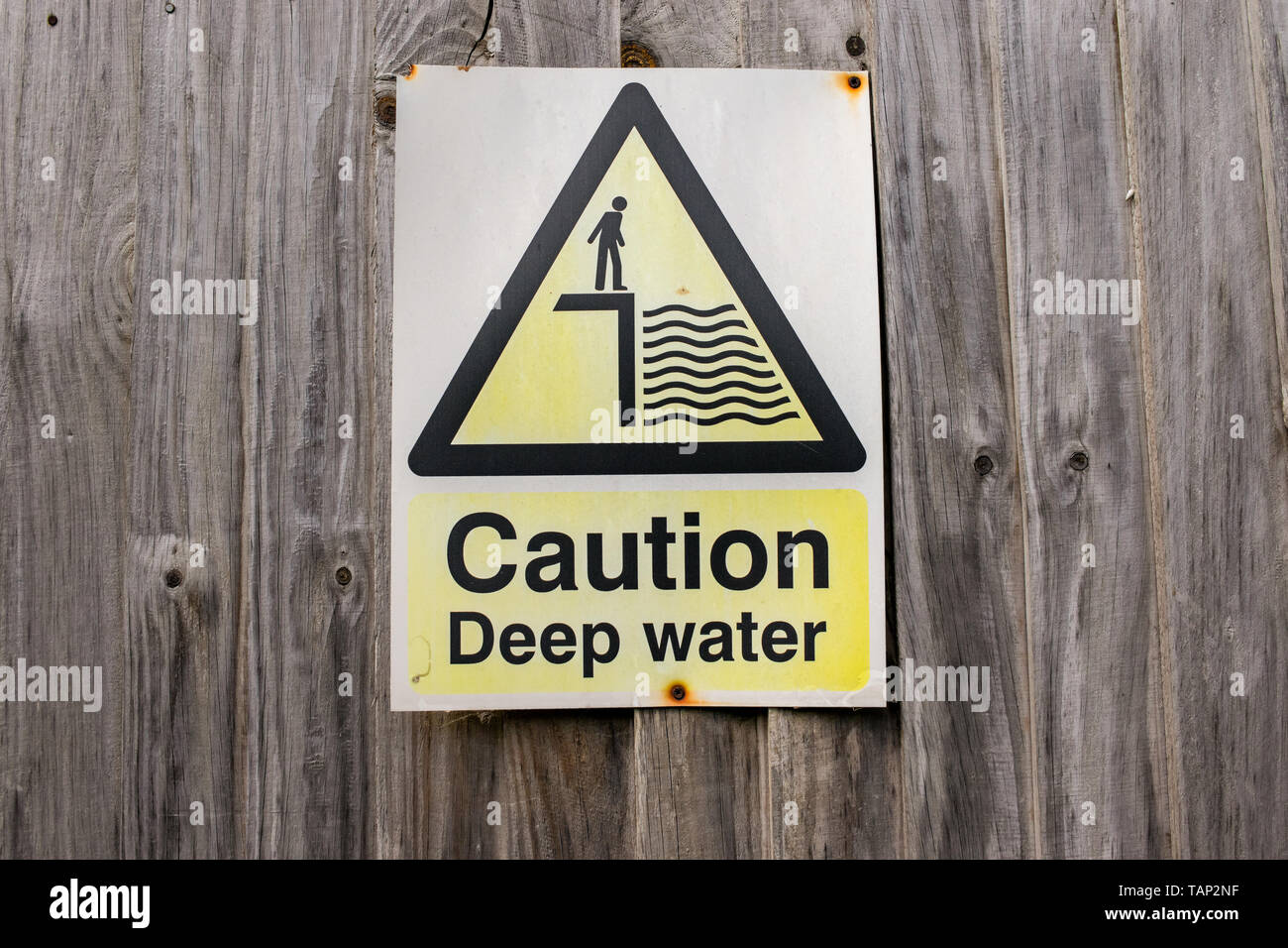 Caution Deep Water Sign, Saltdean Lido Stock Photo - Alamy
