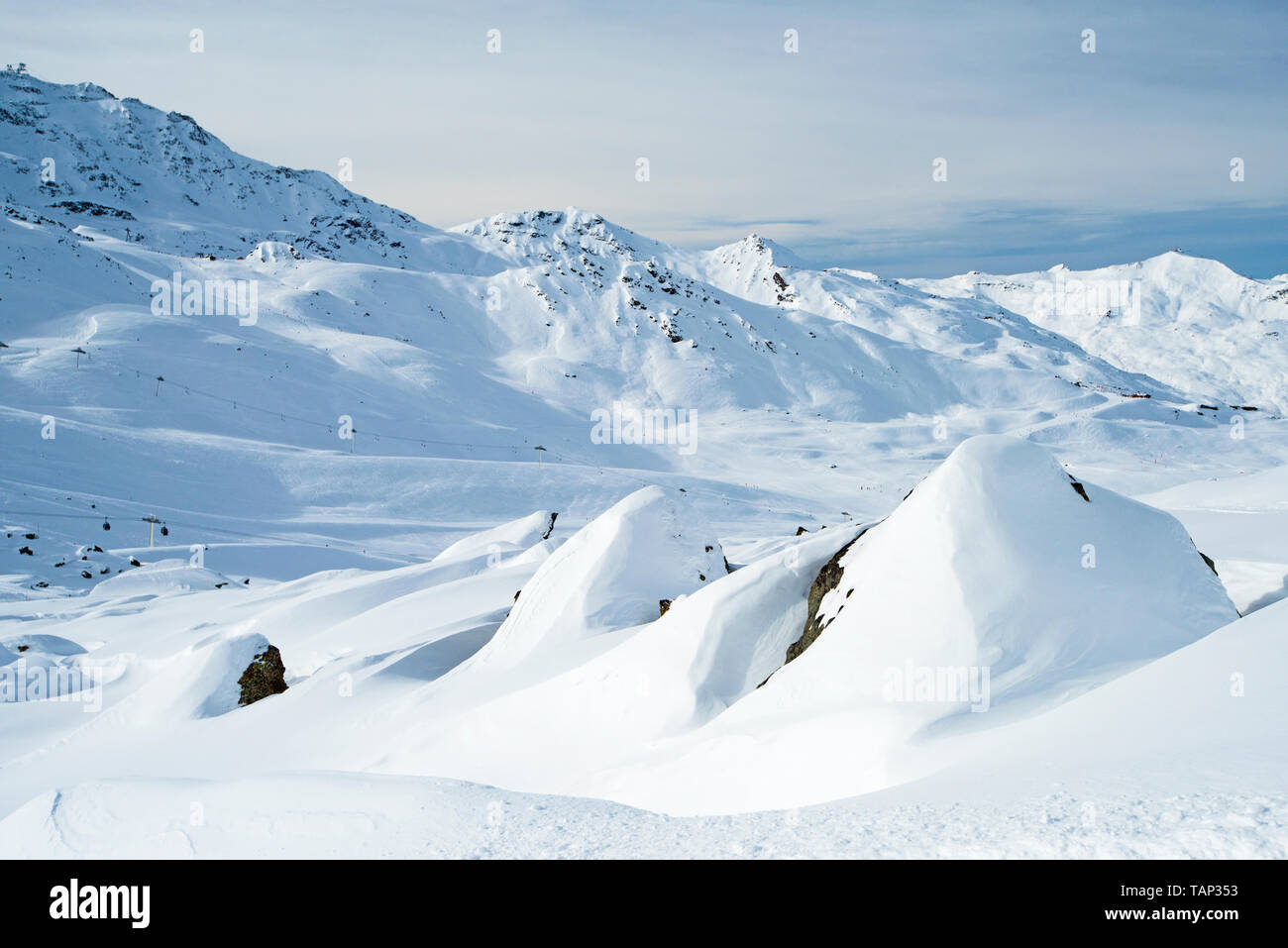 Panoramic view across to snow covered mountain range hi-res stock ...