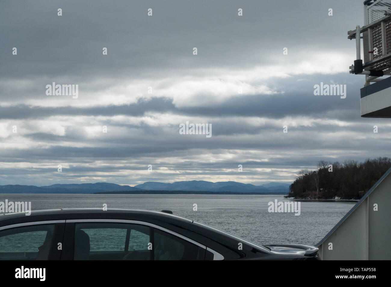 car ferry transporting vehicles across a body of water Stock Photo - Alamy